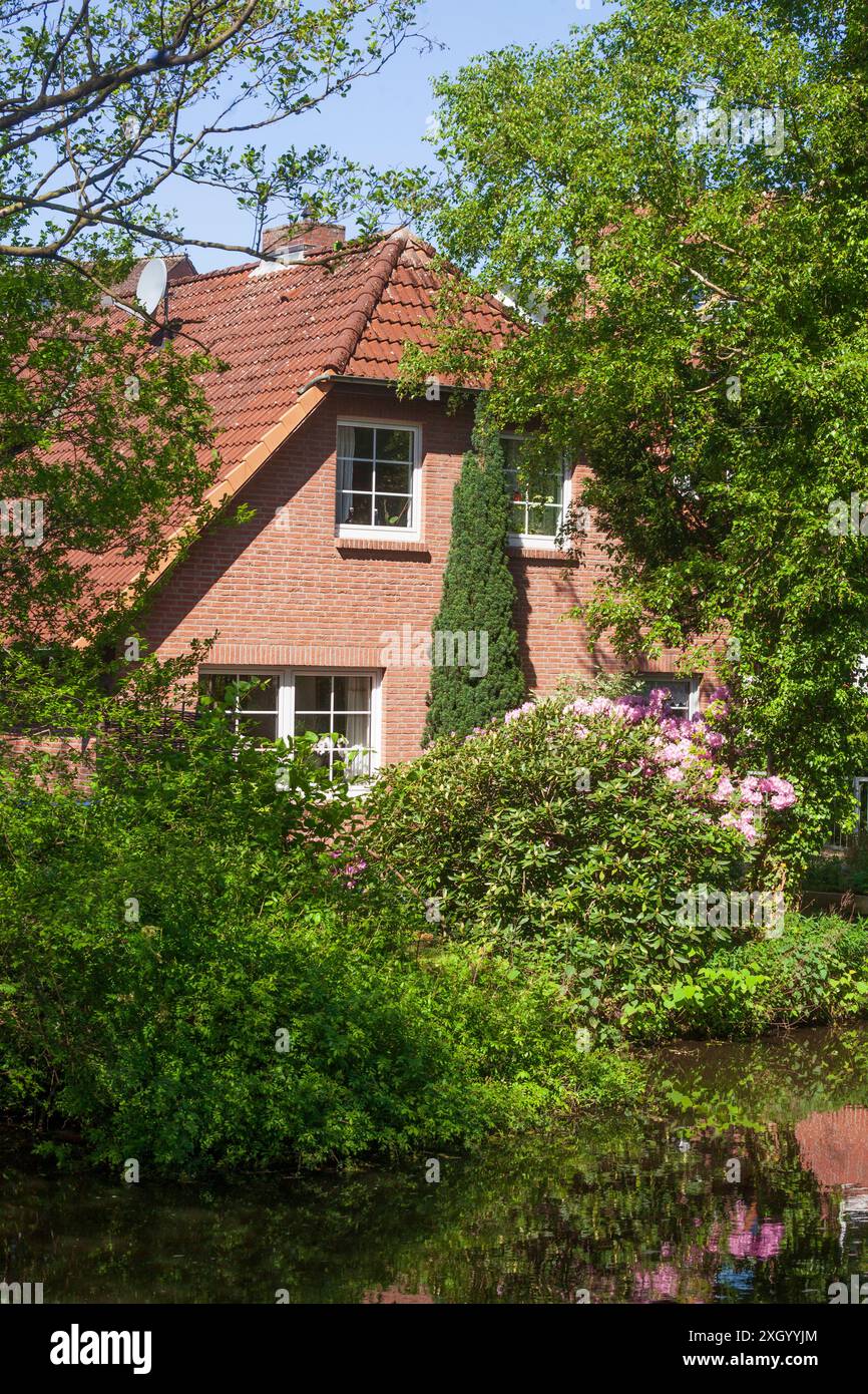 Modern brick residential building on a body of water, Buxtehude, Lower ...
