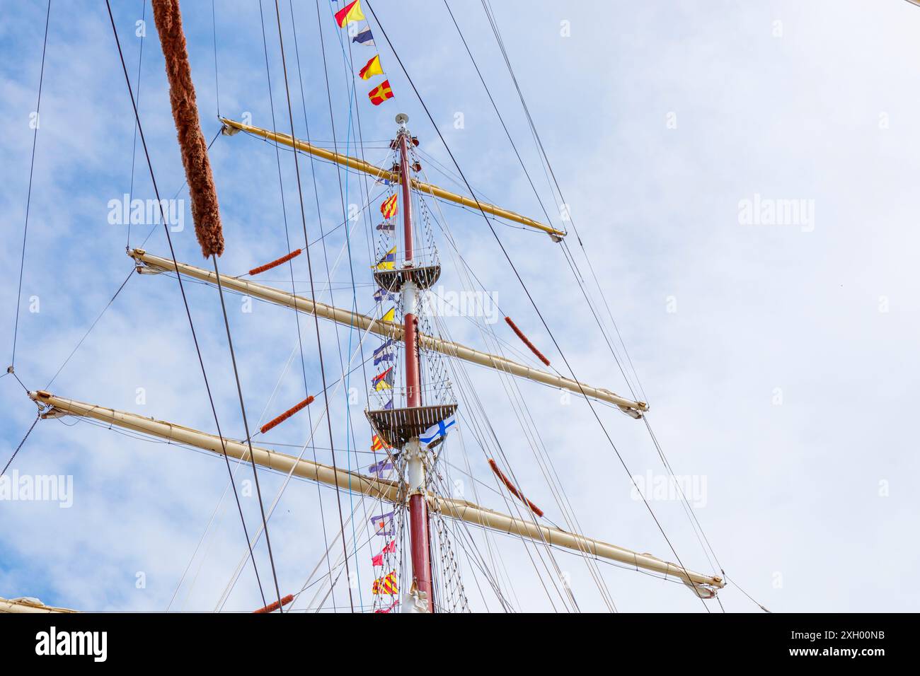 Sailing ship mast with flying nautical flags festival celebration ...