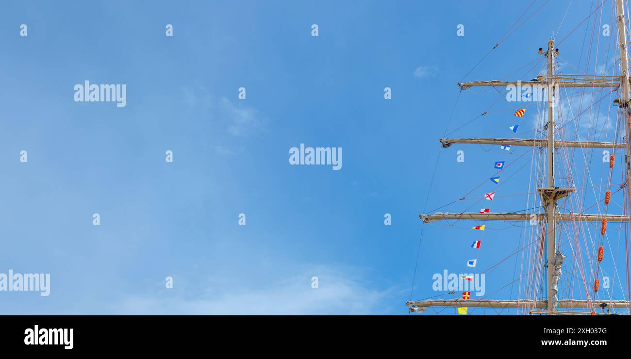 International maritime signal flags on a flagpole and masts on a ...