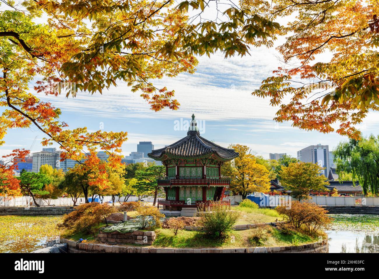 Autumn view of Hyangwonjeong Pavilion on an artificial island of lake ...