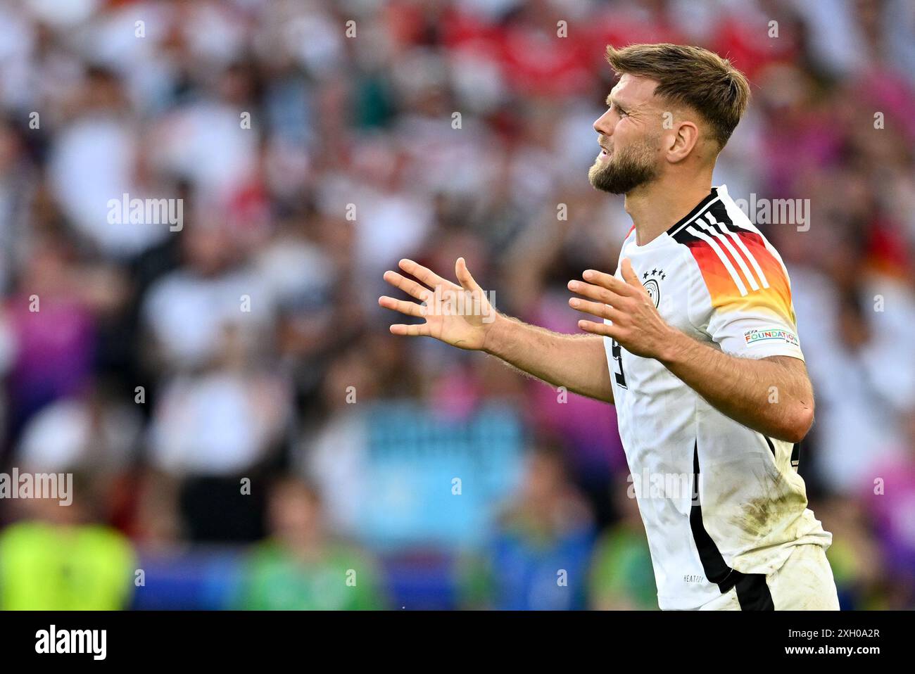 Niclas Fullkrug (9) of Germany reacts during a soccer game between the ...