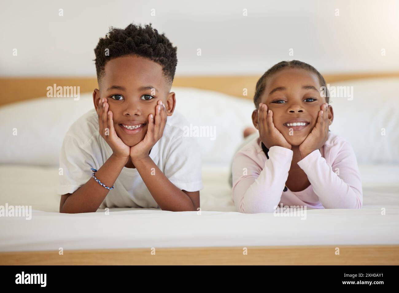 Relax, smile and portrait of black kids in bedroom for bonding, child ...