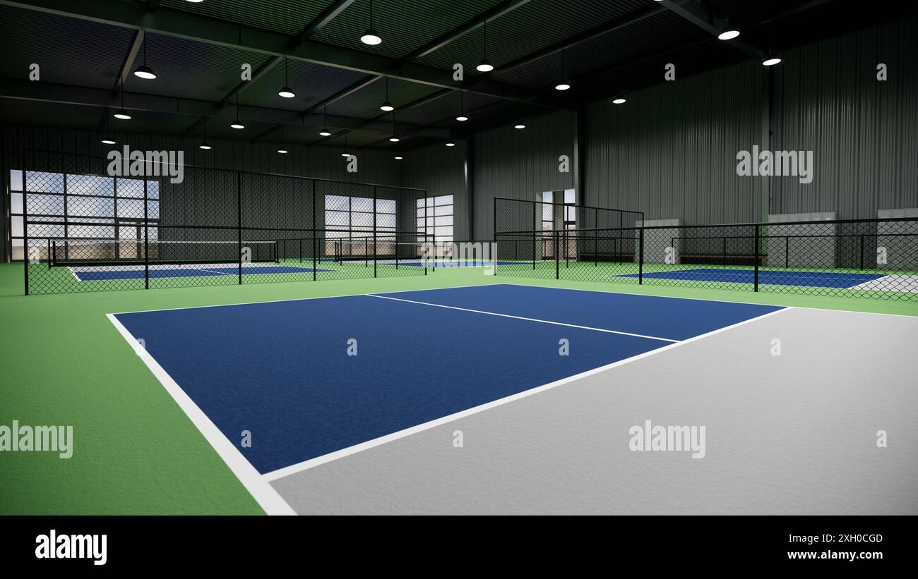 An indoor pickleball tennis court with a blue, green, and gray surface ...