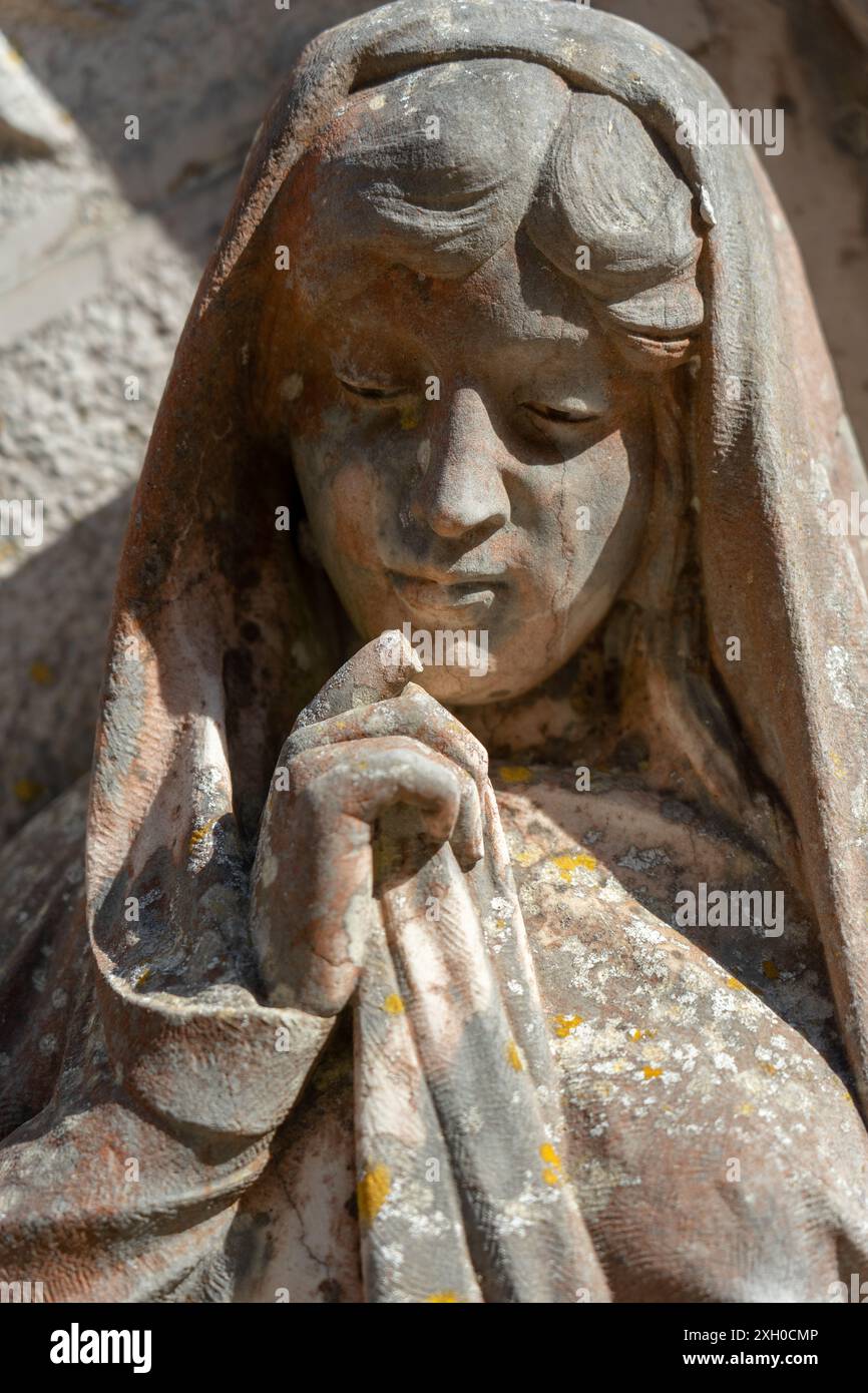 Facial representation of a female human being of a stone statue ...
