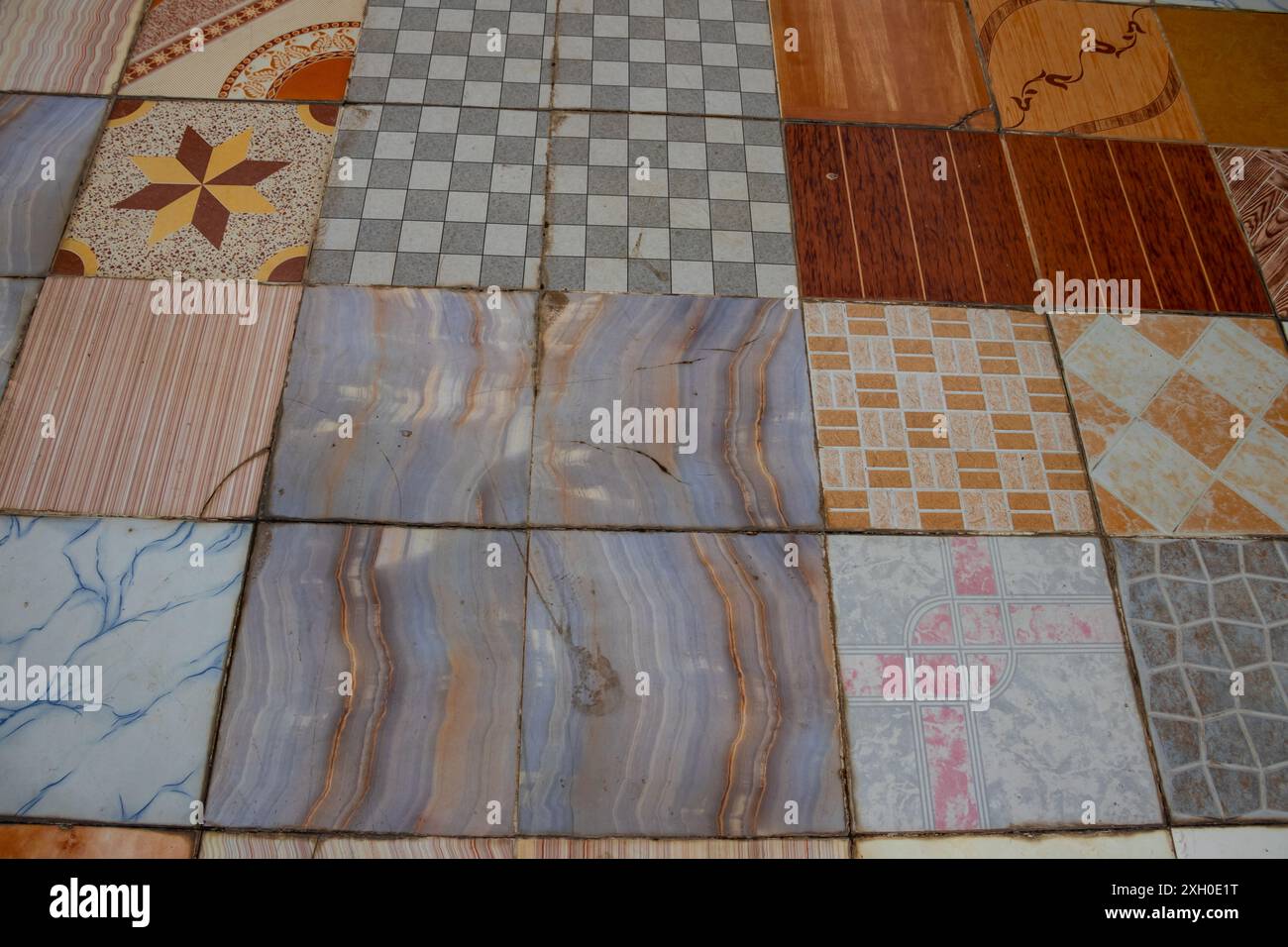 Floor Covered with Ceramic Tiles in Various Designs, Patterns, and Rich ...
