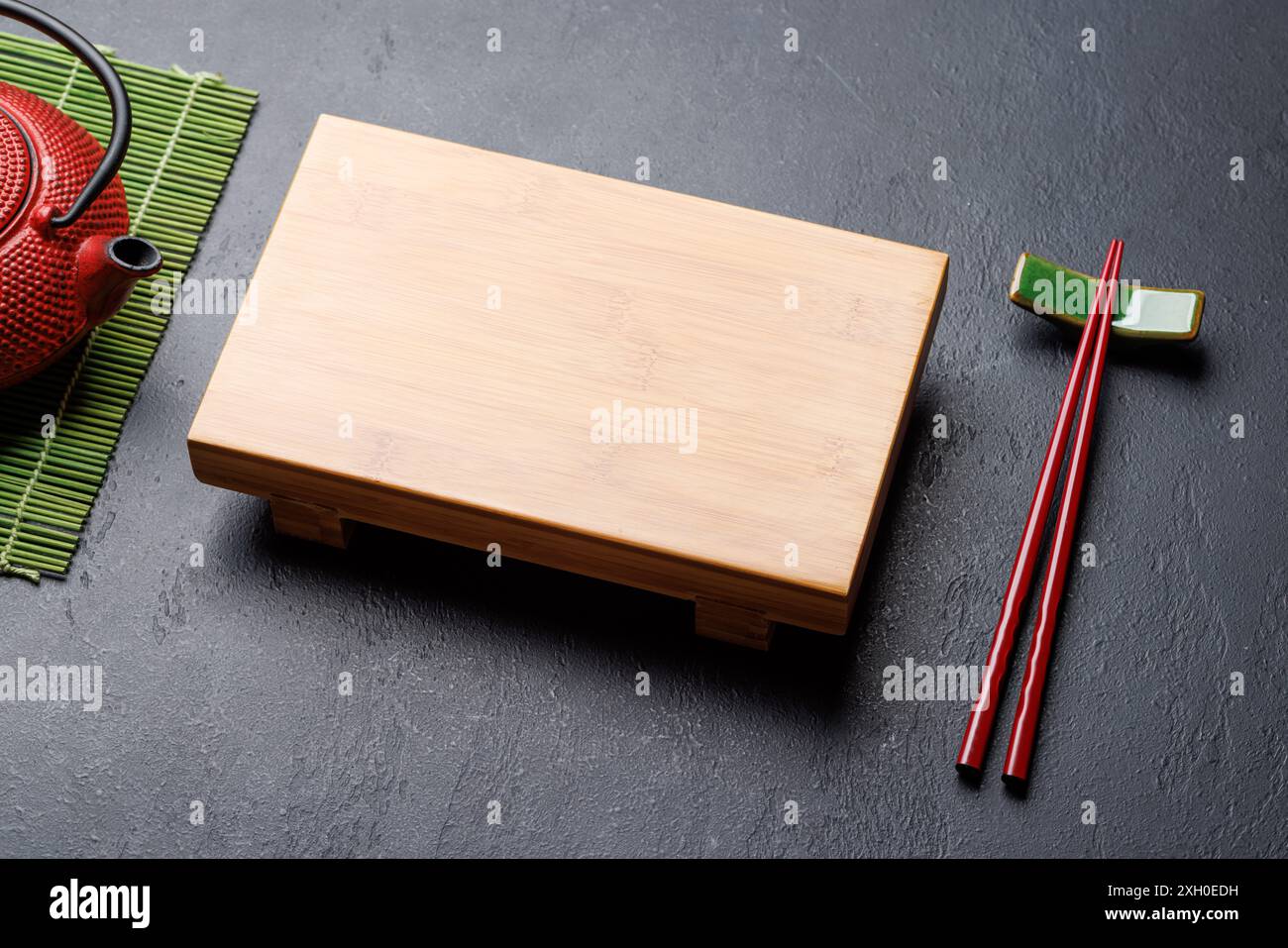 Japanese Table Setting with Wooden Board, Teapot, Chopsticks Stock ...