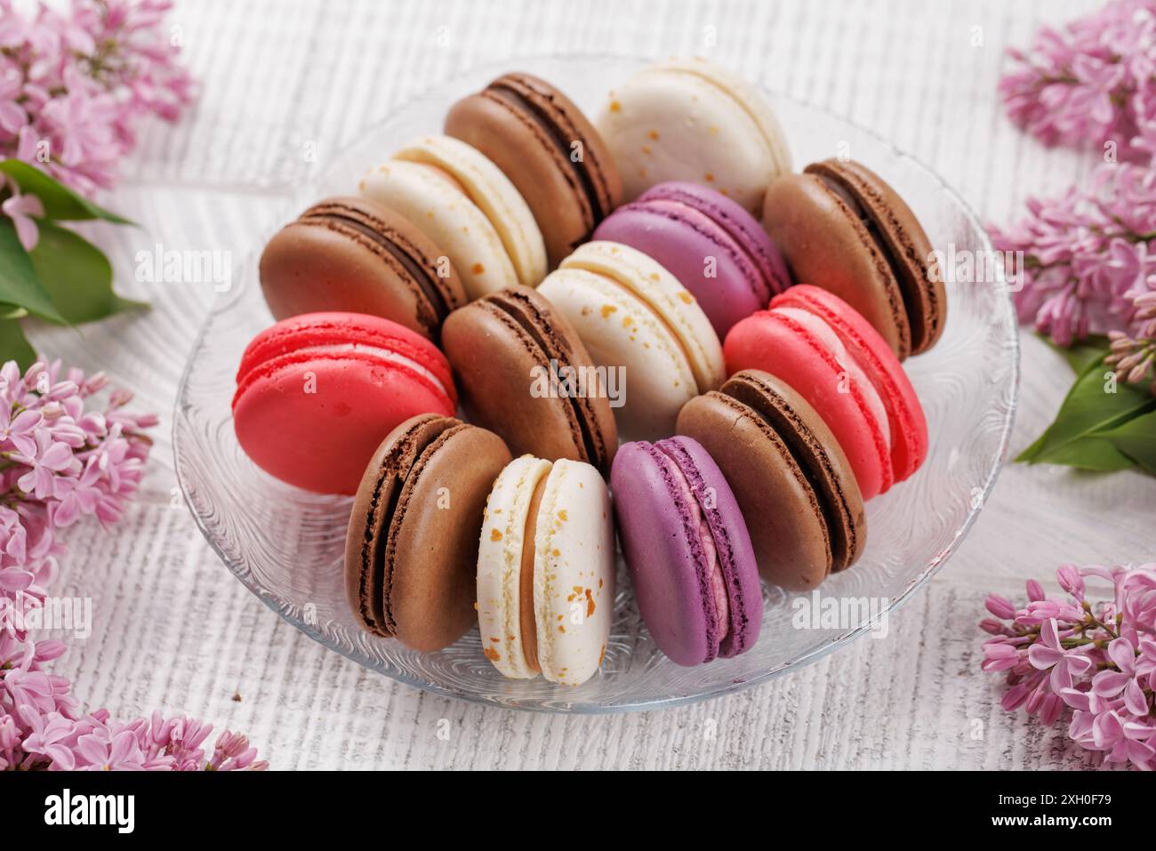 Colorful macaroons, arranged in a delightful display of vibrant hues ...