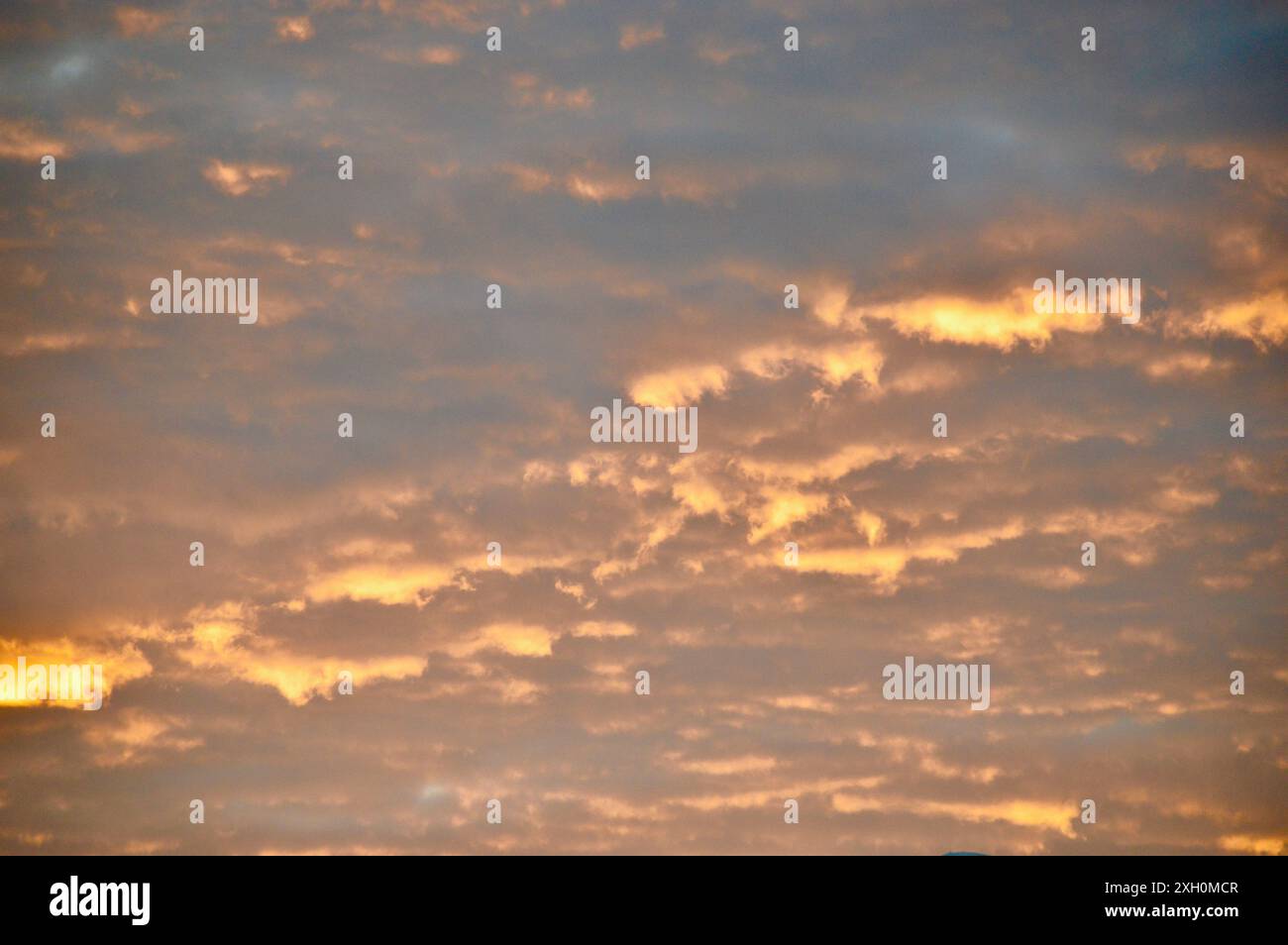 sunset sky orange blue paradise background textured Stock Photo - Alamy