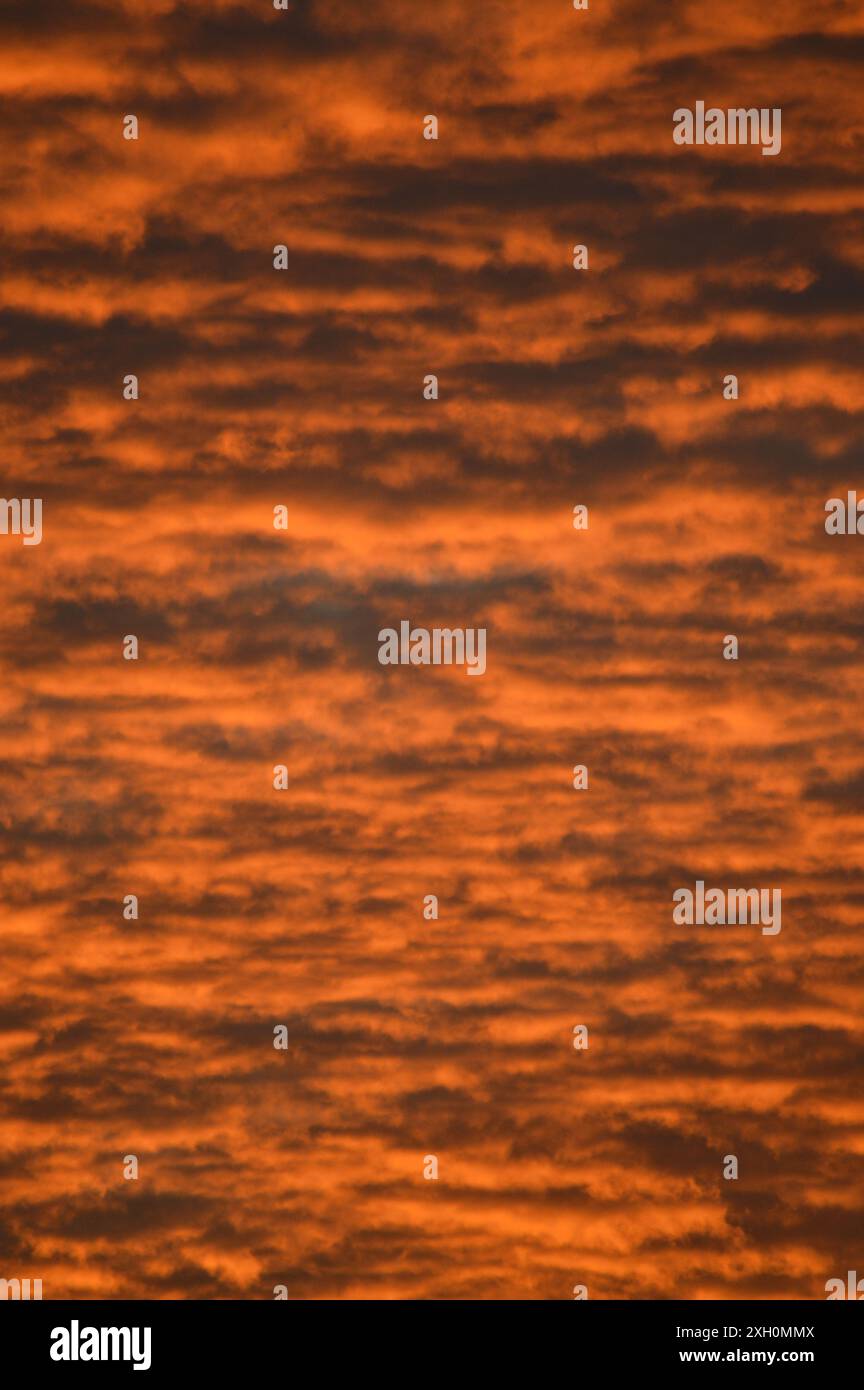 sunset sky orange blue paradise background textured Stock Photo - Alamy