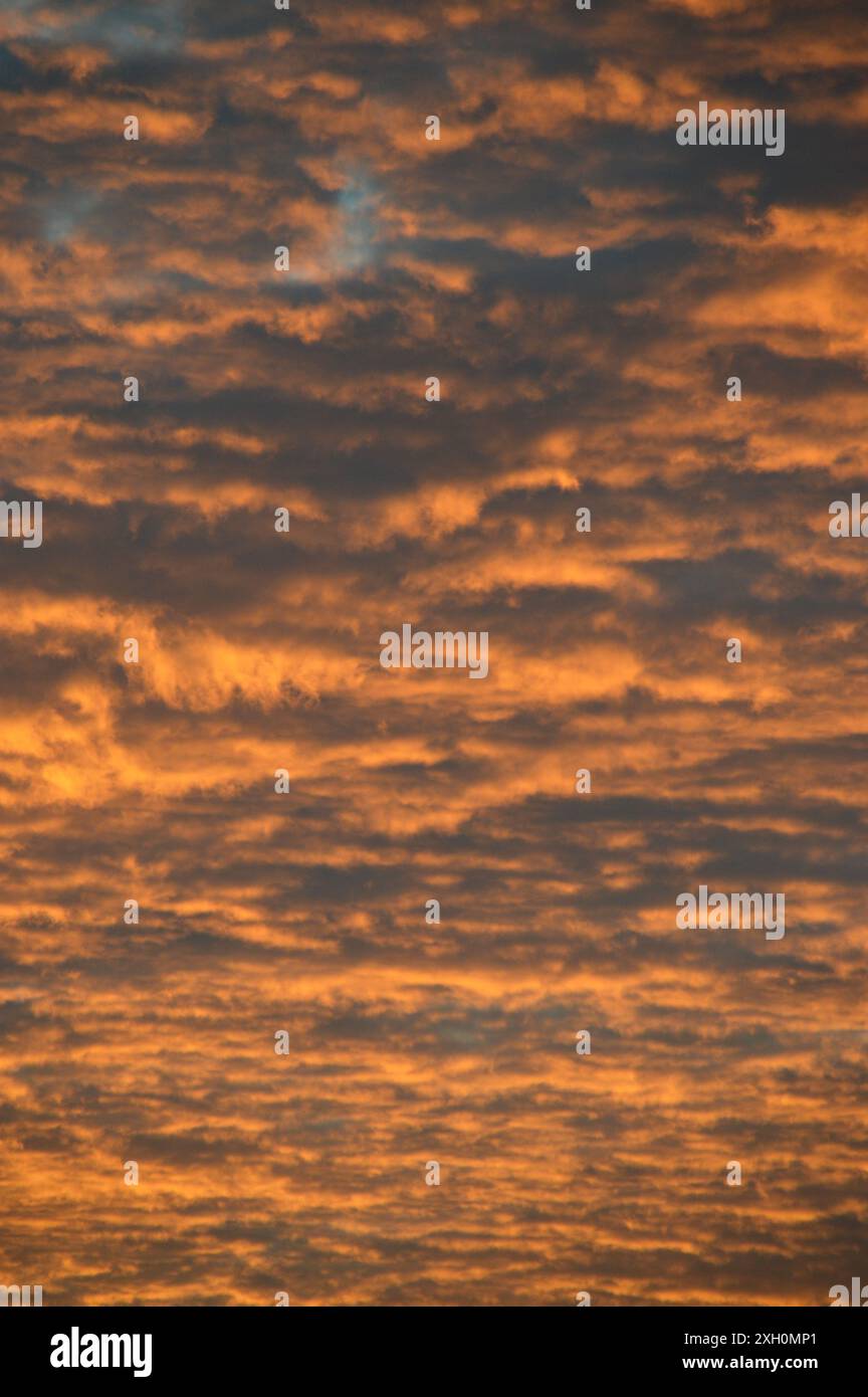 sunset sky orange blue paradise background textured Stock Photo - Alamy