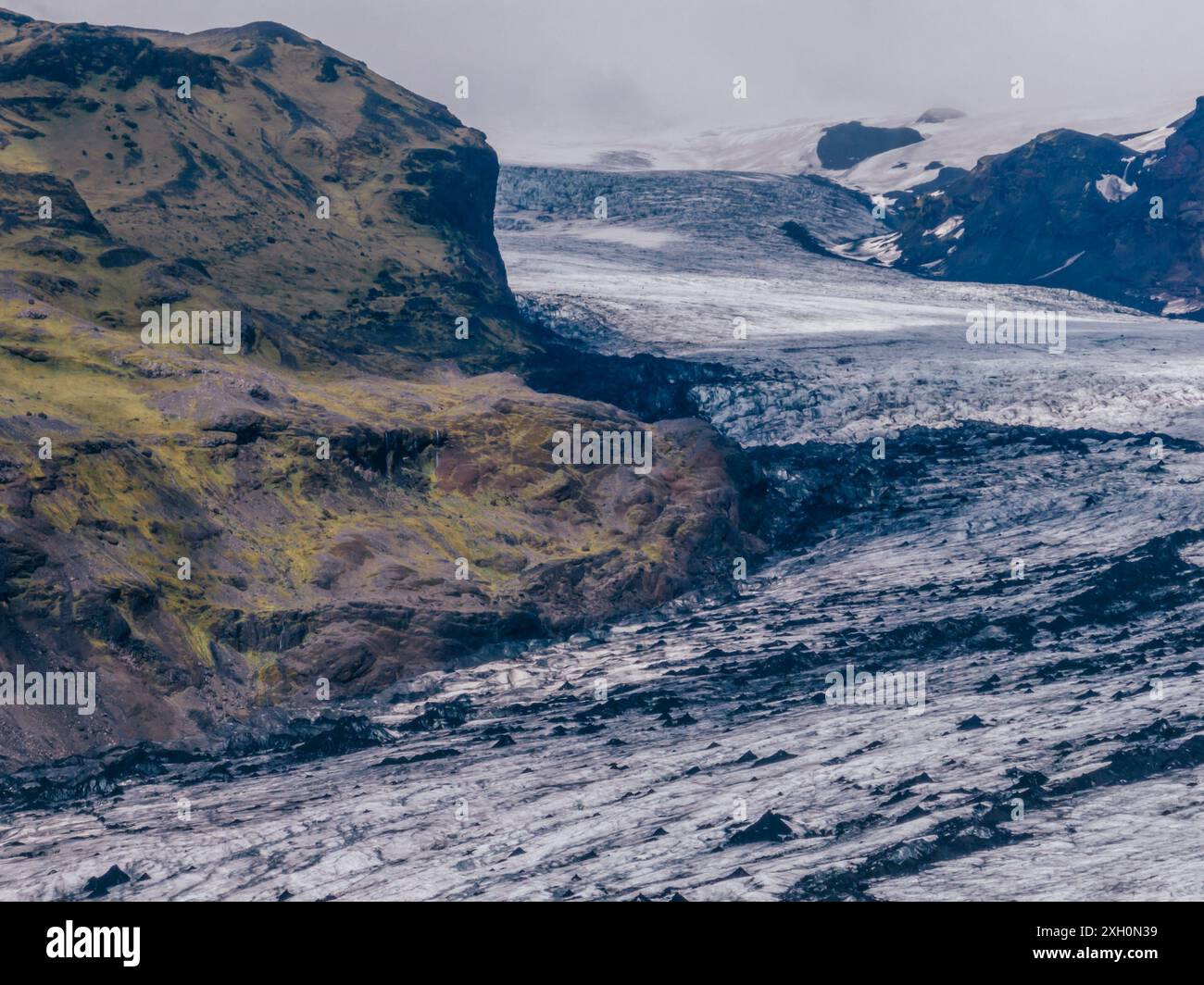 Aerial view of Solheimajokull glacier in Iceland, featuring vibrant ...