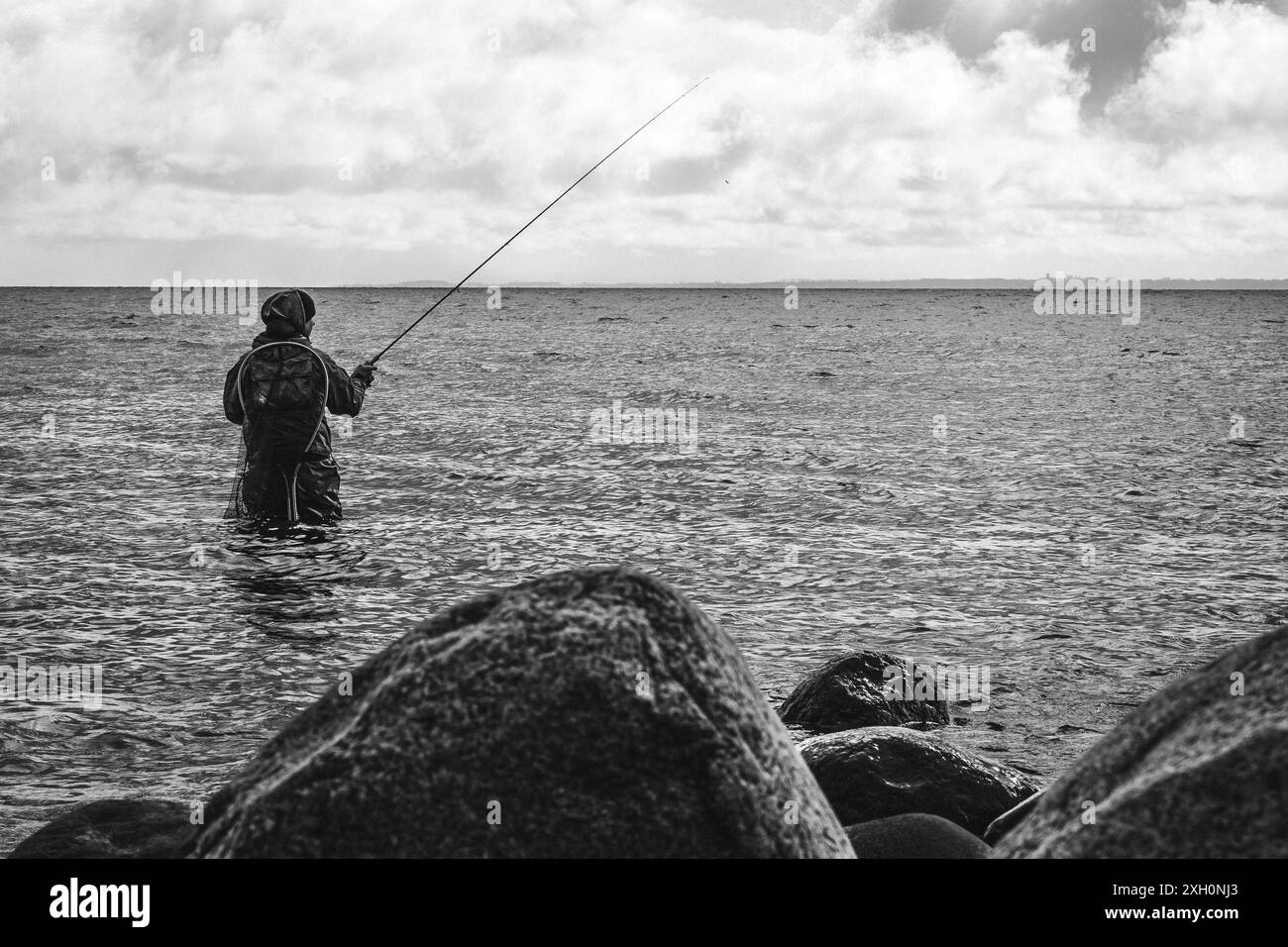 Two anglers at the sea hi-res stock photography and images - Alamy