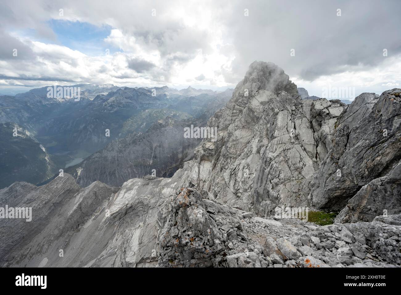 Clouds around a narrow rocky ridge, Watzmann crossing to Watzmann ...