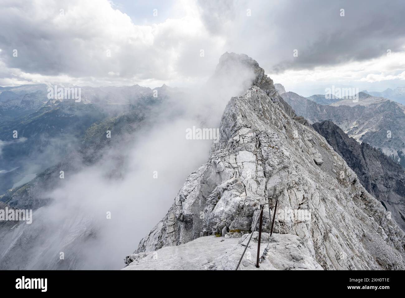 Clouds around a narrow rocky ridge, Watzmann crossing to Watzmann ...