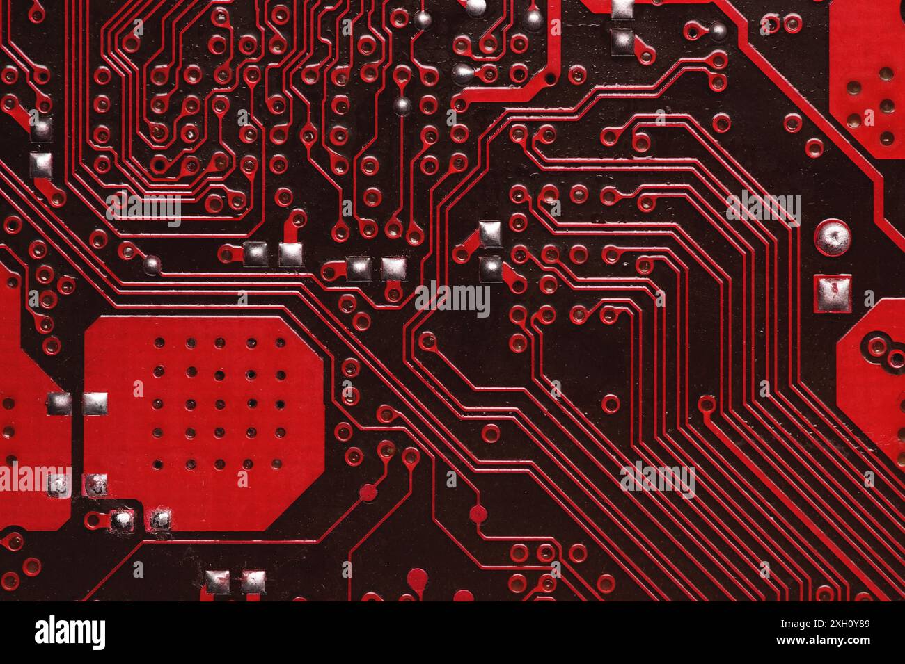Macro image of a red printed circuit board. technology background Stock ...