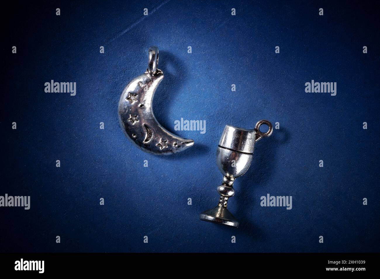The Moon and the chalice, symbols of a Wiccan ritual, a flat lay on a ...