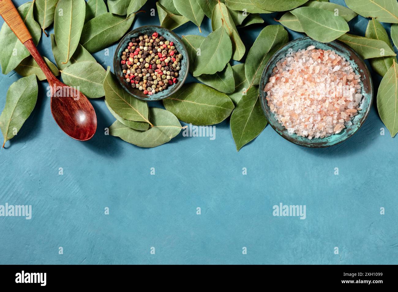 Cooking banner with copy space. A flat lay with salt, pepper, bay ...
