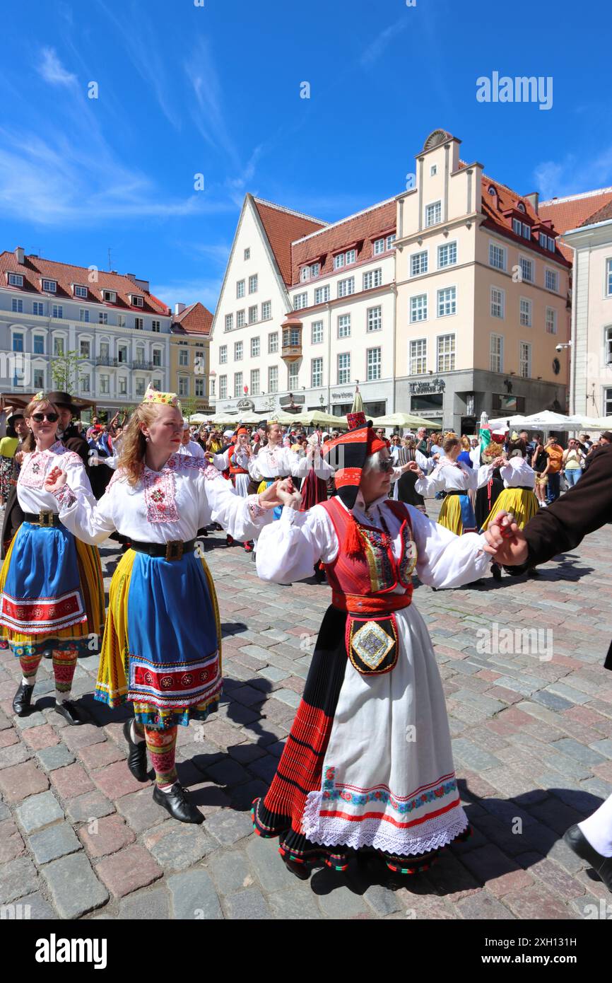 Dancers in traditional costumes celebrating mid-summers day in the town ...