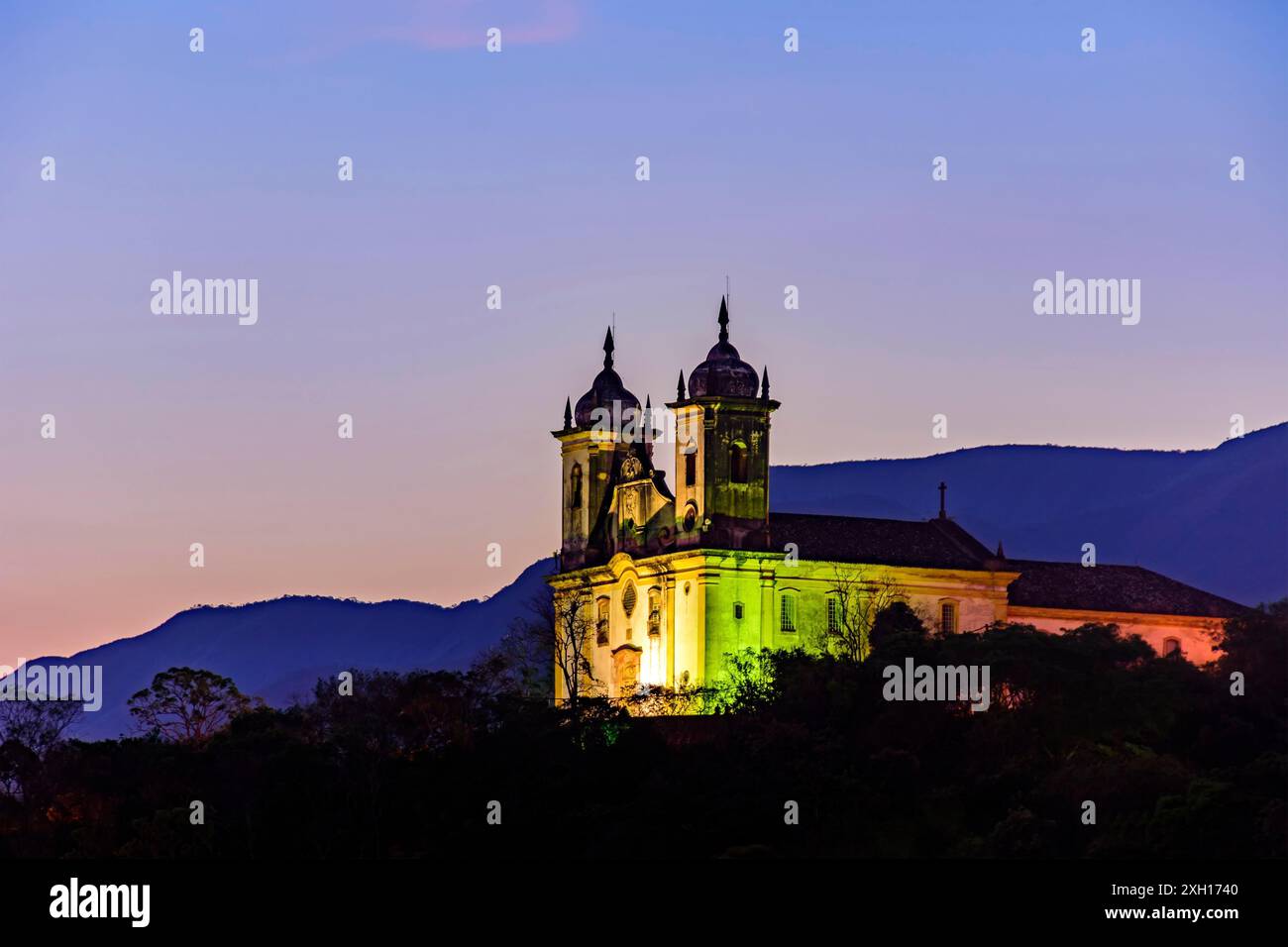 Night view of the historic 18th century church and hills at Ouro Preto ...