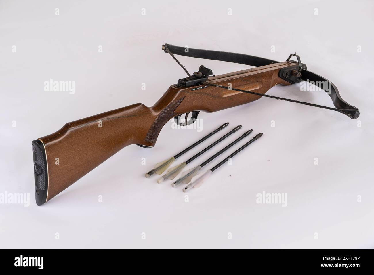 Studio photographs of a crossbow with bolts Stock Photo - Alamy