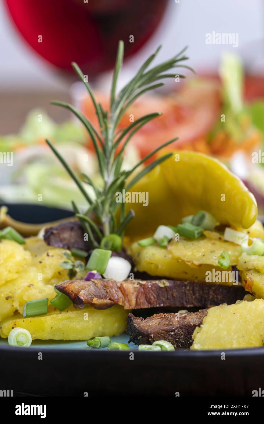 Austrian potato groestl with red wine Stock Photo - Alamy