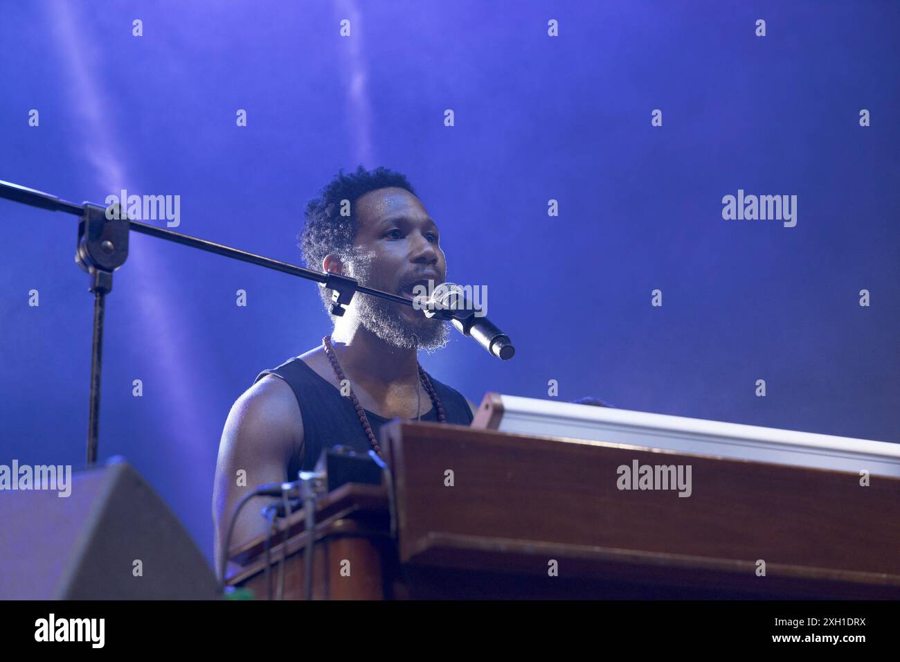 Cory Henry singing on stage during the Music for yo solul world tour ...