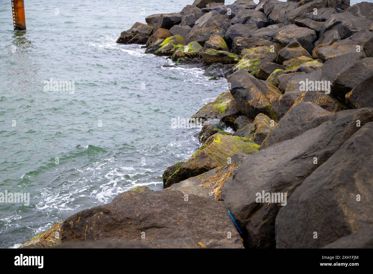 Stone pier in the North Sea in Denmark Stock Photo - Alamy