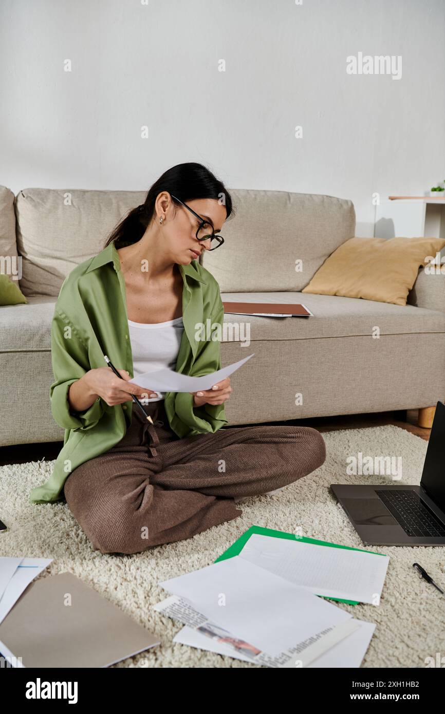 Woman paperwork on floor hi-res stock photography and images - Alamy