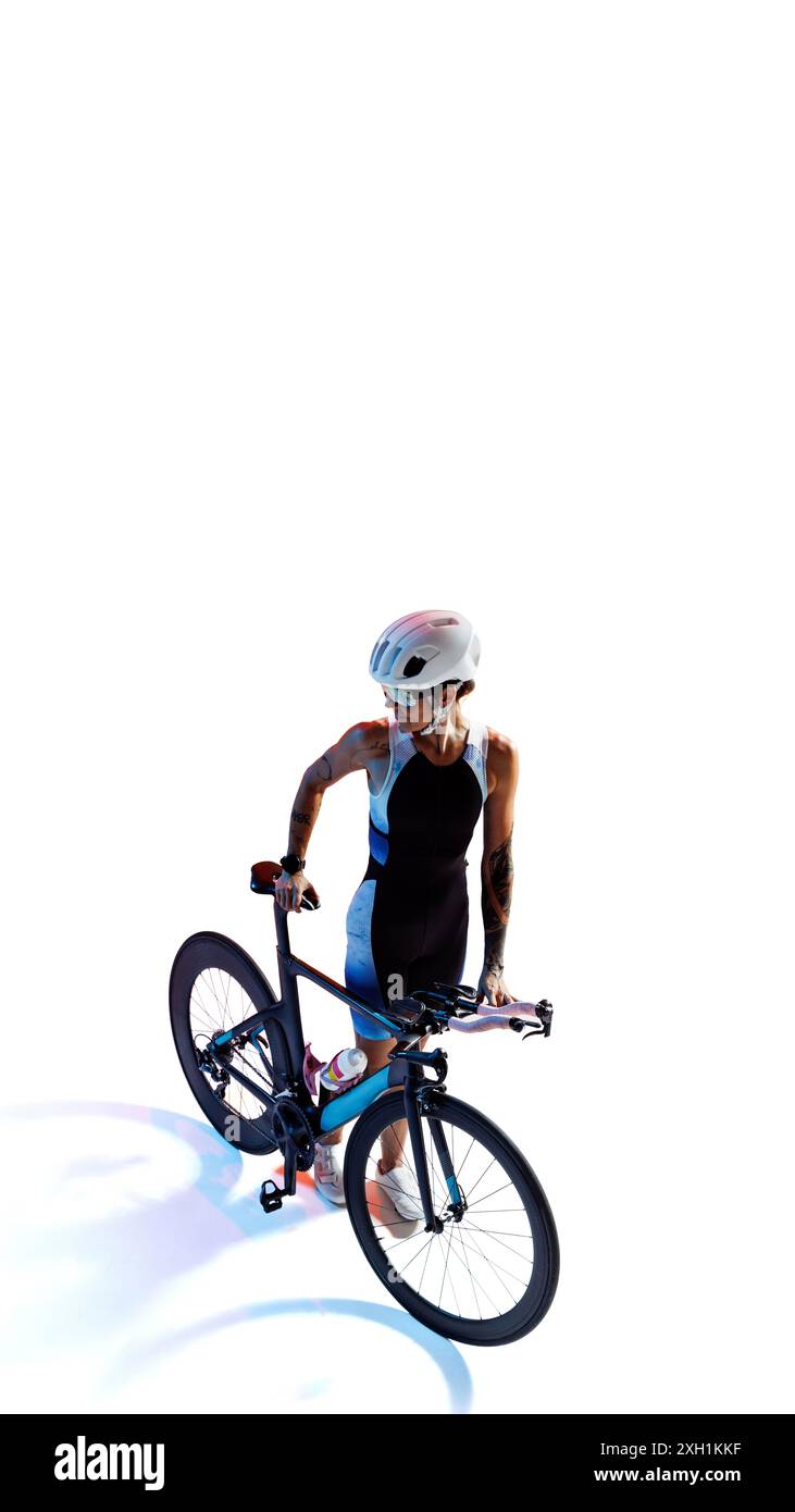 Woman, cyclist in black gear and aerodynamic helmet standing with ...