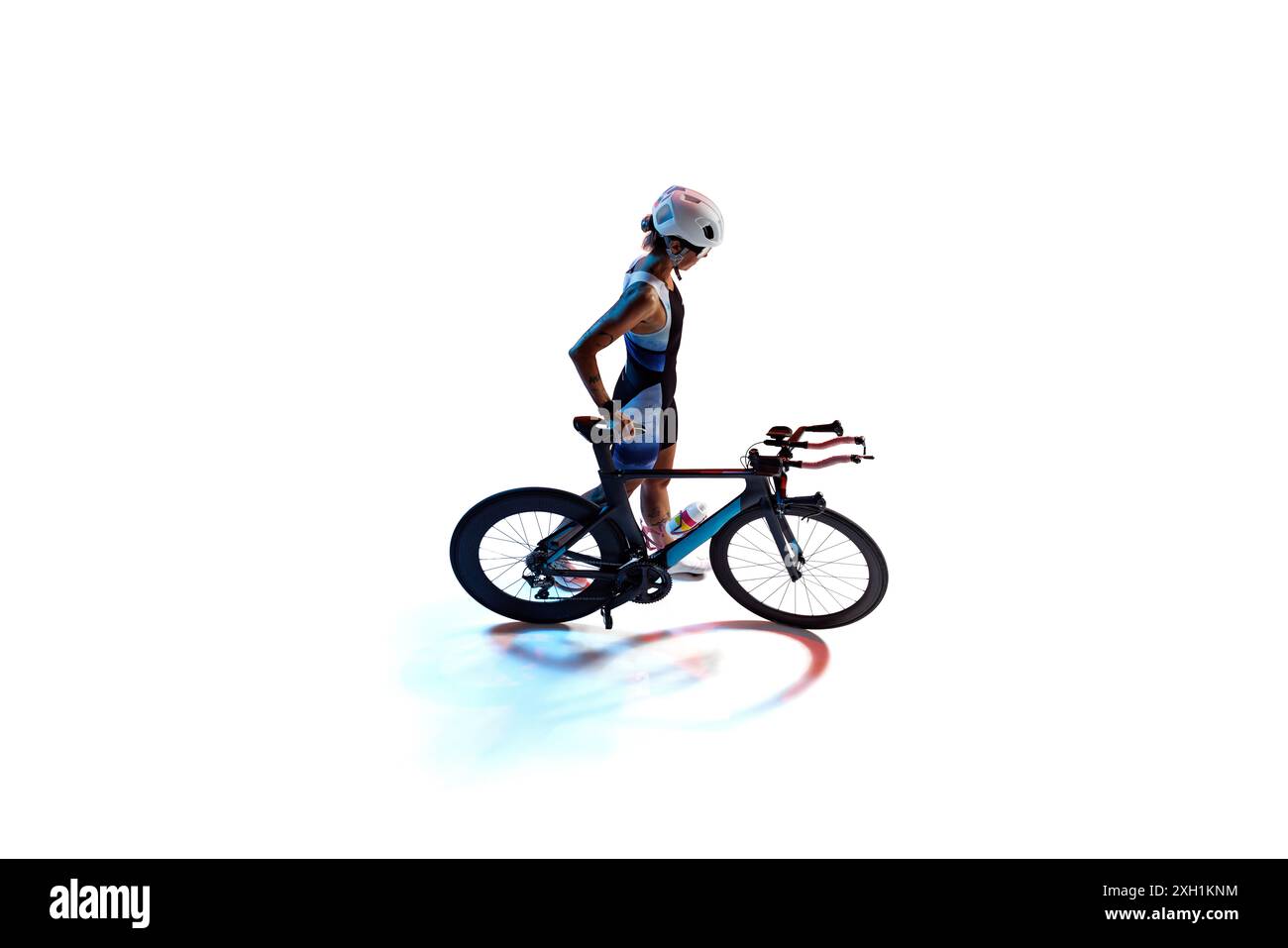 Woman, cyclist in black gear and aerodynamic helmet standing with ...