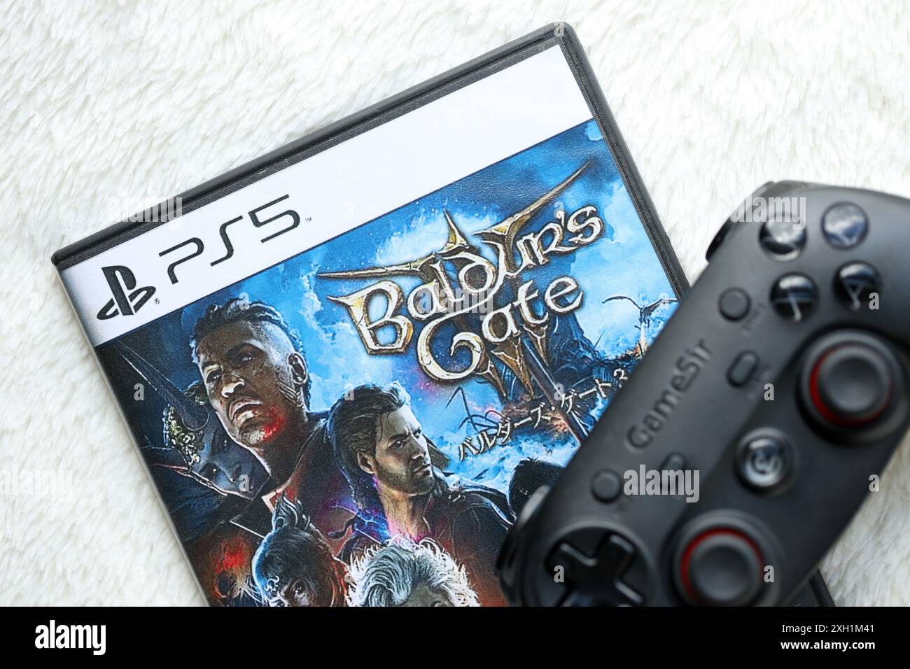 KYIV, UKRAINE - JUNE 26, 2024 Baldur's Gate 3 PS5 video game disc box ...