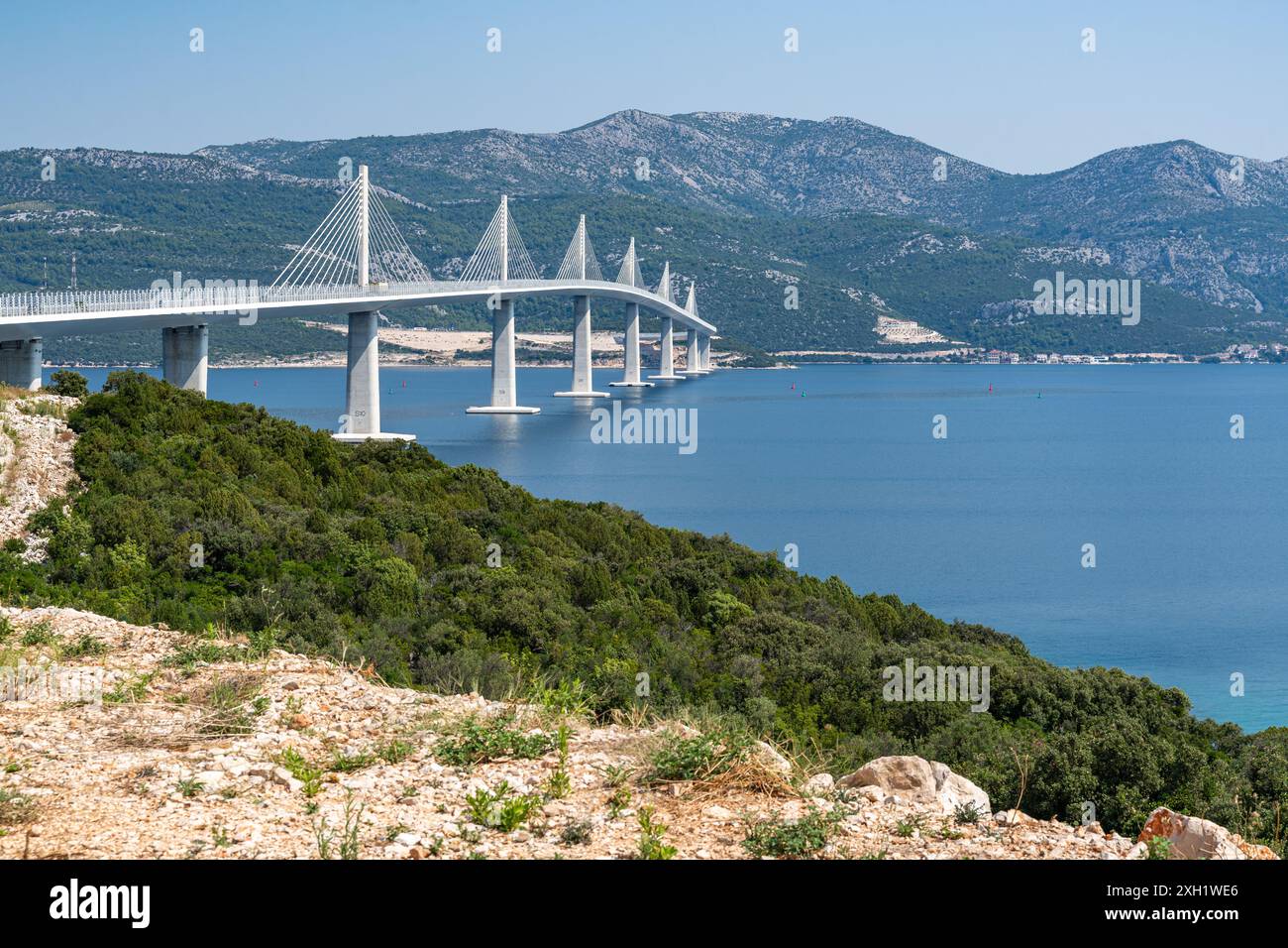 The Peljesac Bridge spanning over the Adriatic Sea with mountainous ...