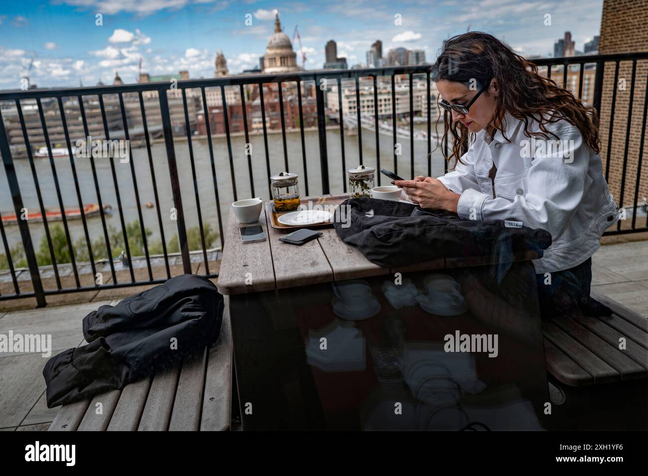 Tate Modern London England June 2024 Enjoying a coffee break on the ...