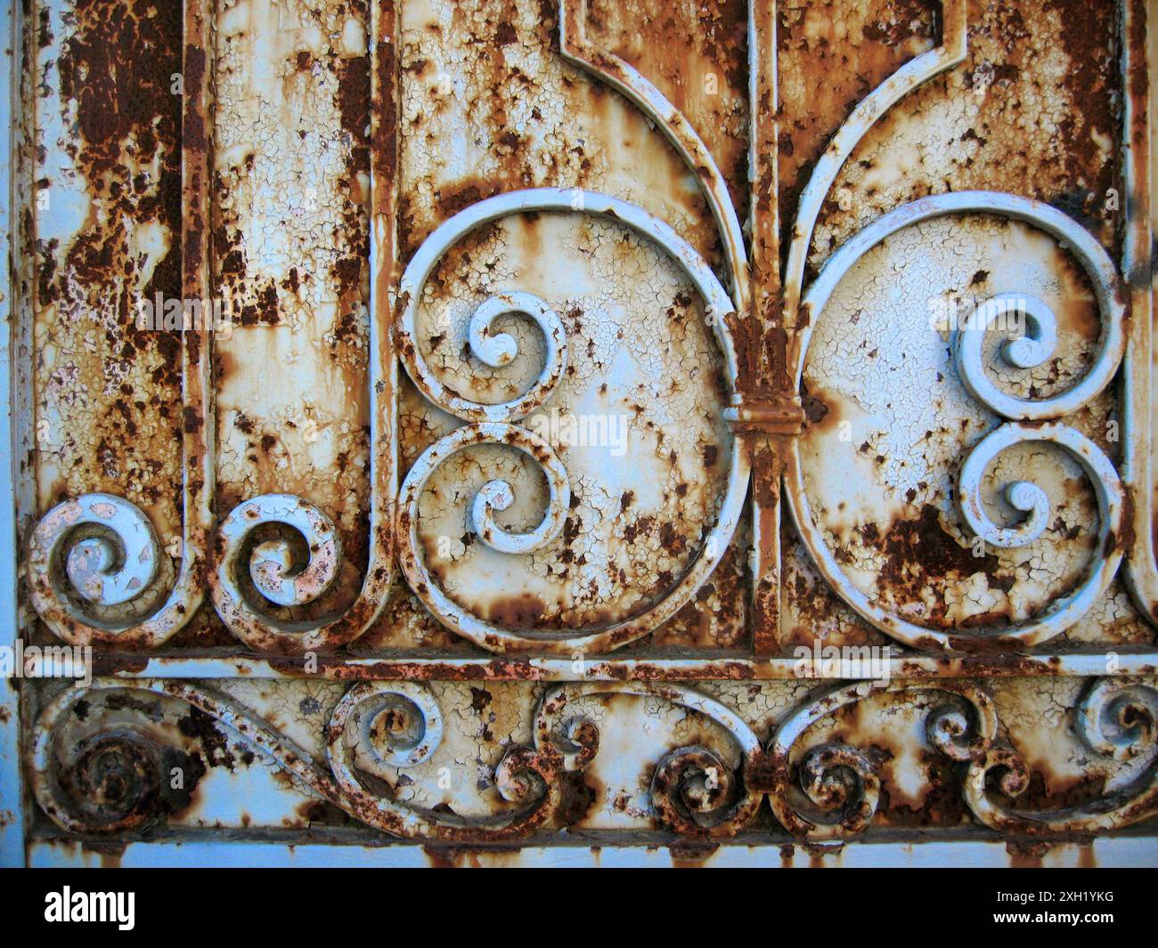 Old rusty decorated metal fence close up outdoors Stock Photo - Alamy