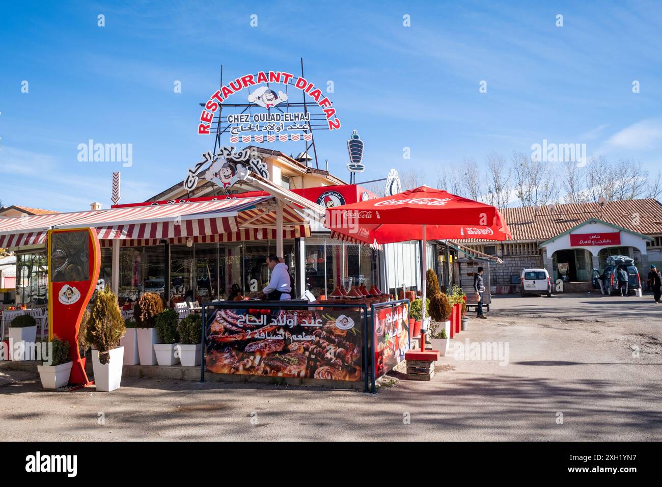 Advertising sign of a roadside restaurant near the town of Ifrane in ...