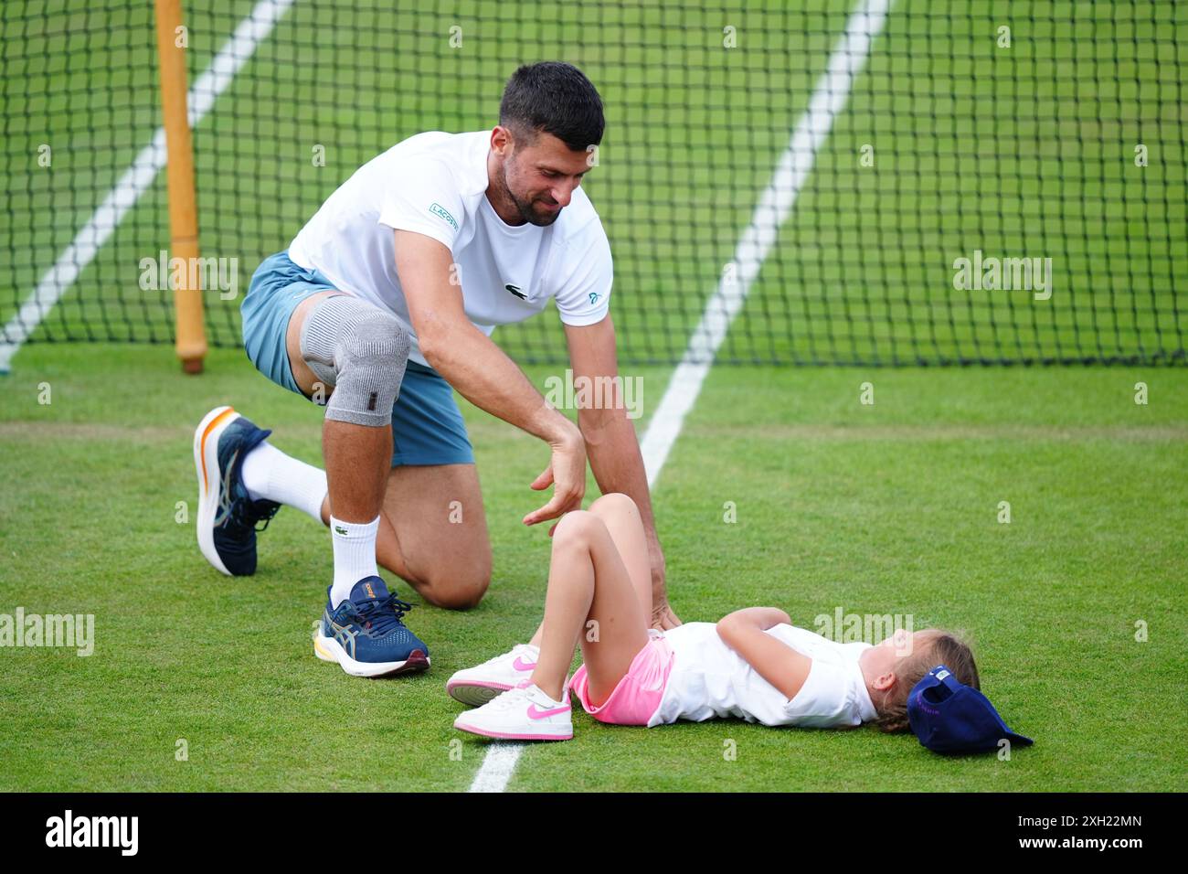 Novak Djokovic and his daughter Tara on day eleven of the 2024 ...