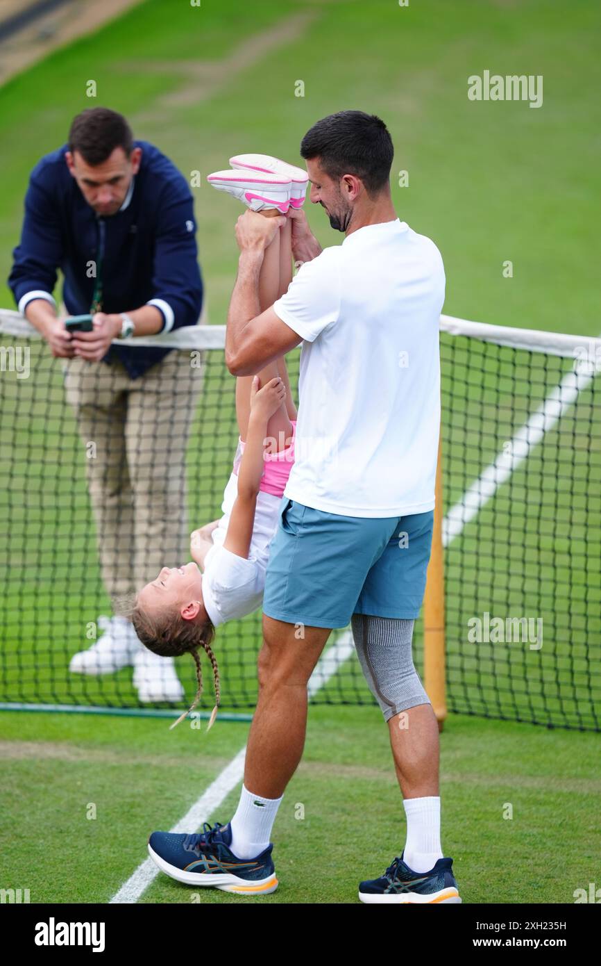 Novak Djokovic and his daughter Tara on day eleven of the 2024 ...