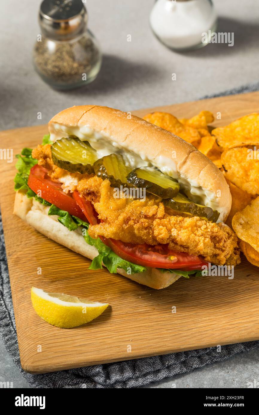 Southern Homemade Catfish Poboy Sandwich with Lettuce Tomato and Pickle ...