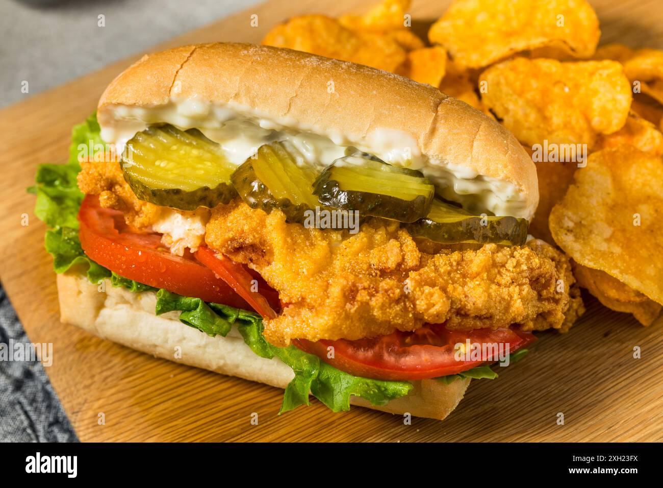 Southern Homemade Catfish Poboy Sandwich with Lettuce Tomato and Pickle ...