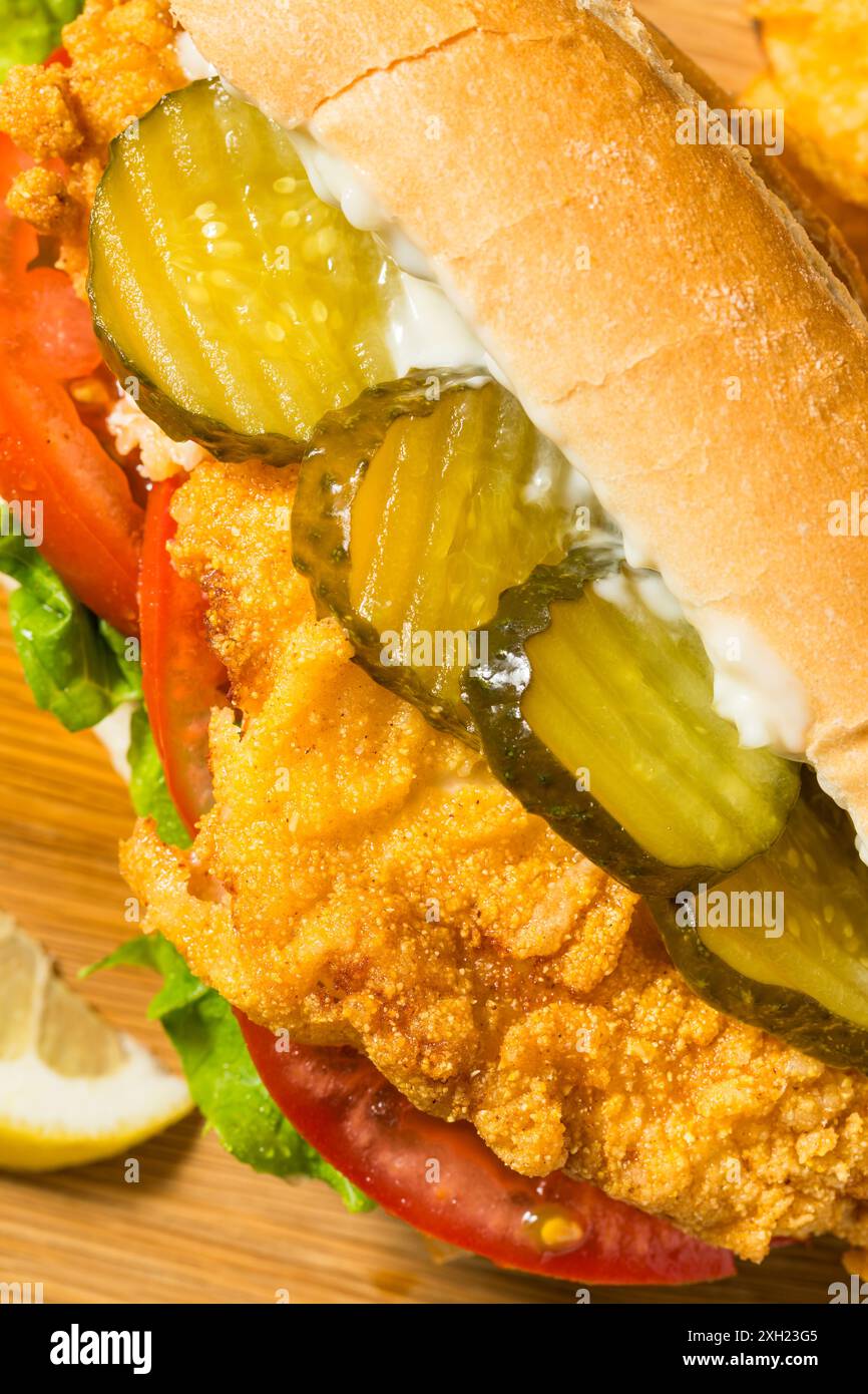 Southern Homemade Catfish Poboy Sandwich with Lettuce Tomato and Pickle ...
