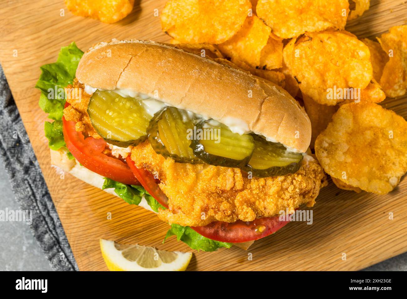 Southern Homemade Catfish Poboy Sandwich with Lettuce Tomato and Pickle ...