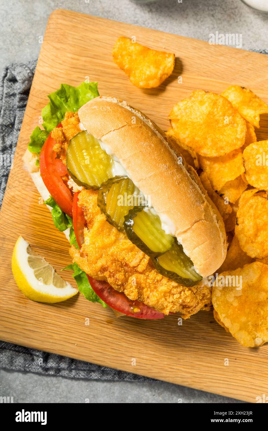 Southern Homemade Catfish Poboy Sandwich with Lettuce Tomato and Pickle ...