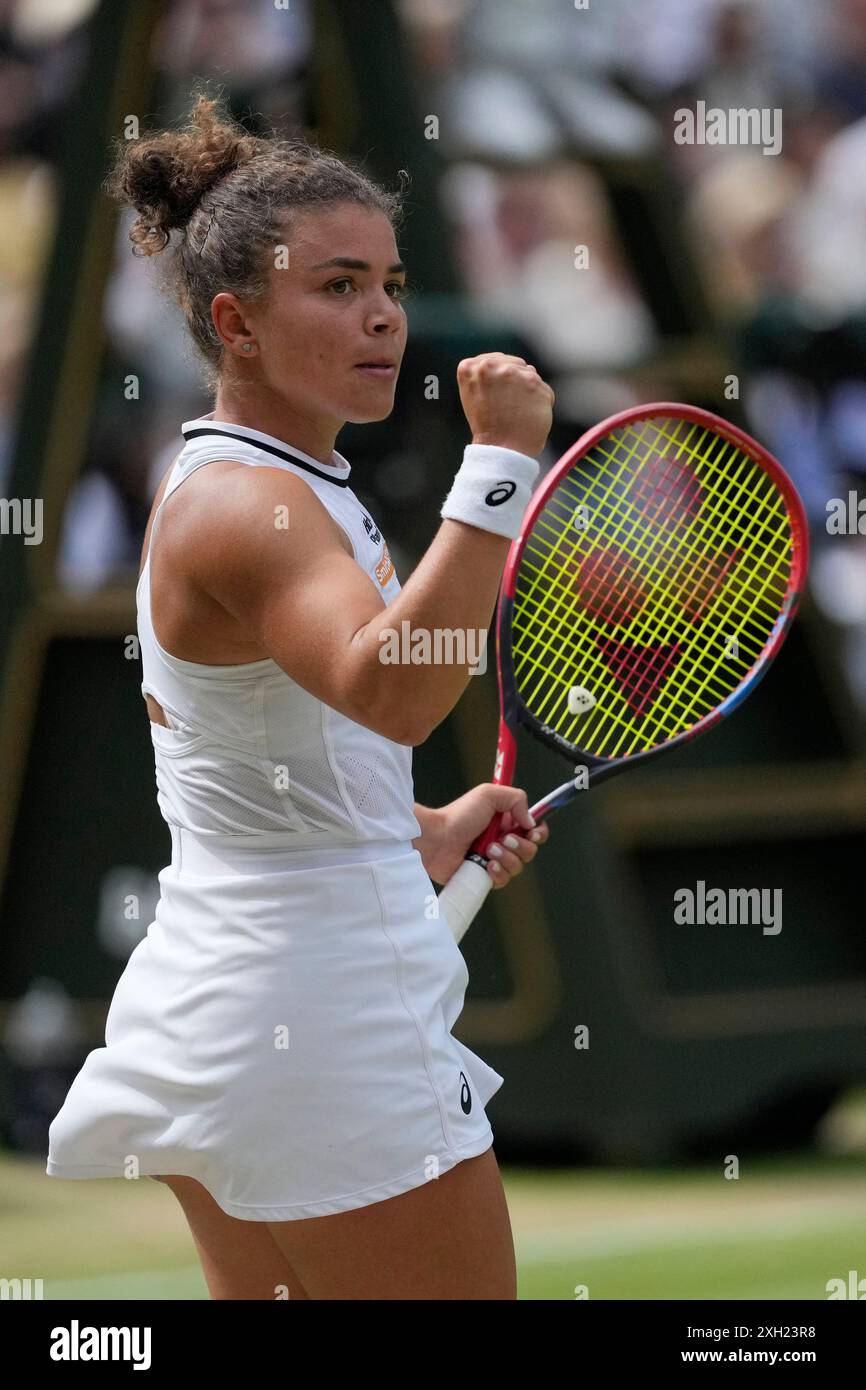 Jasmine Paolini of Italy celebrates after winning a point against Donna ...