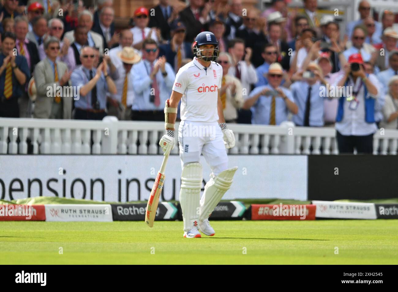 London, England. 11th July 2024. Jimmy Anderson walks out to bat in his ...