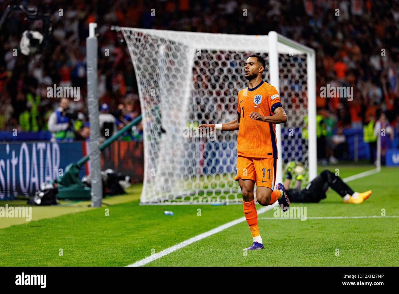 Cody Gakpo seen celebrating after scoring goal during UEFA Euro 2024 ...