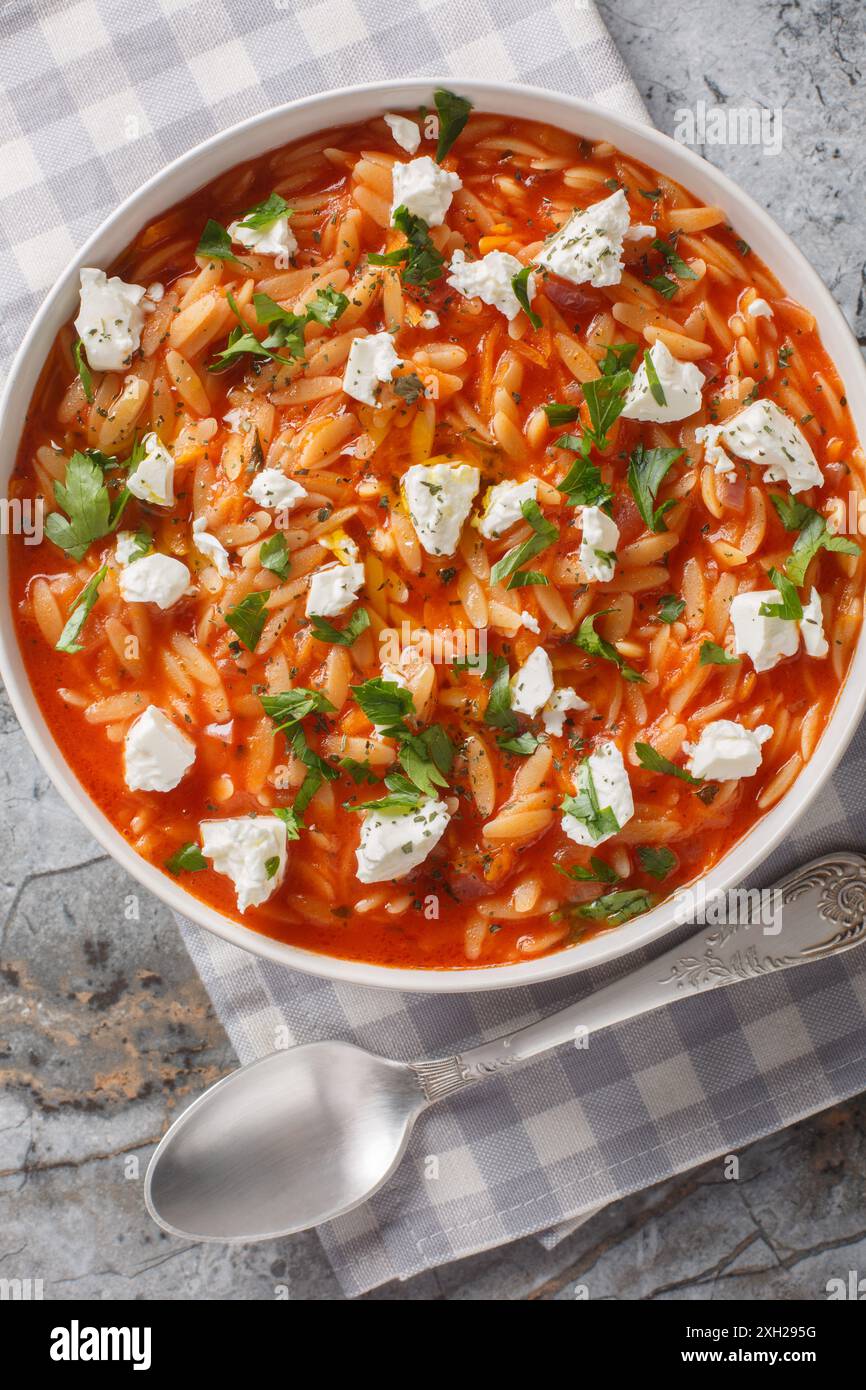 One-pot Greek orzo kritharaki with tomatoes and Feta cheese is a ...