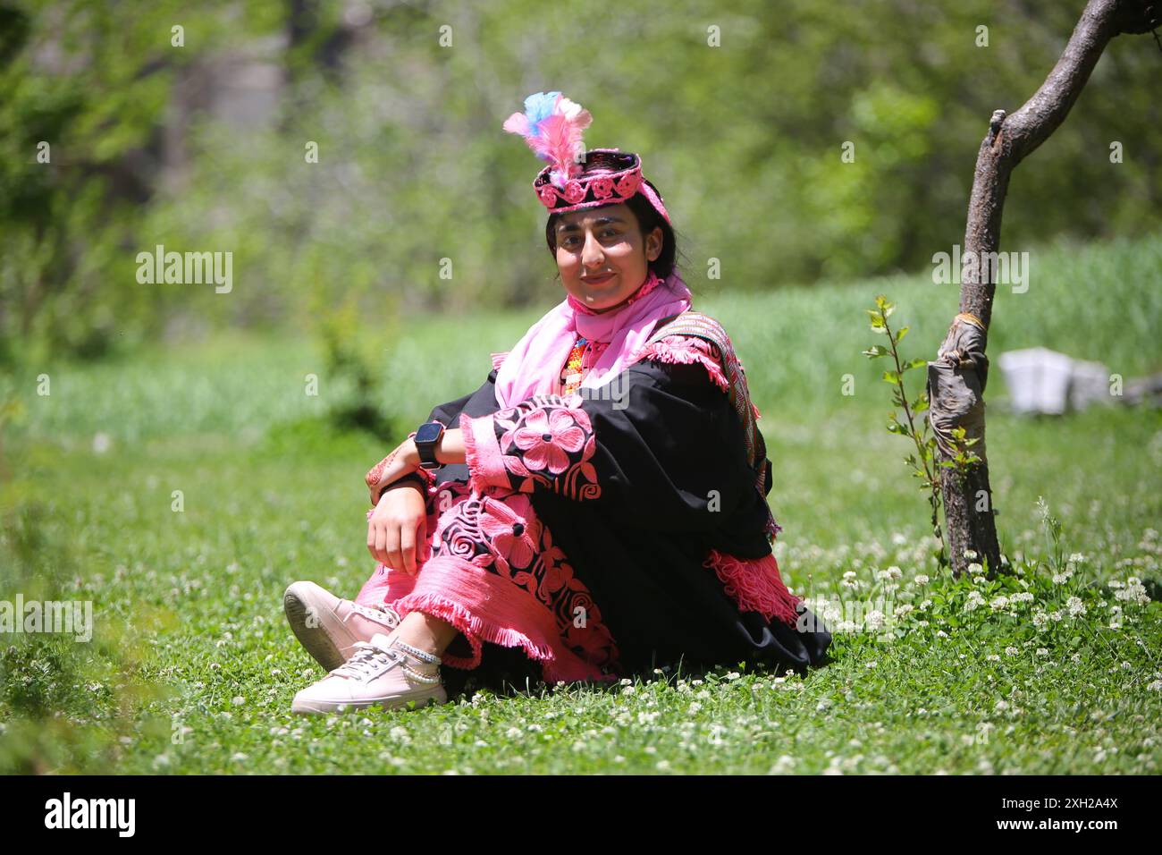 Portrait image of Kalash tribe girl in tradditional costume from rumbur ...
