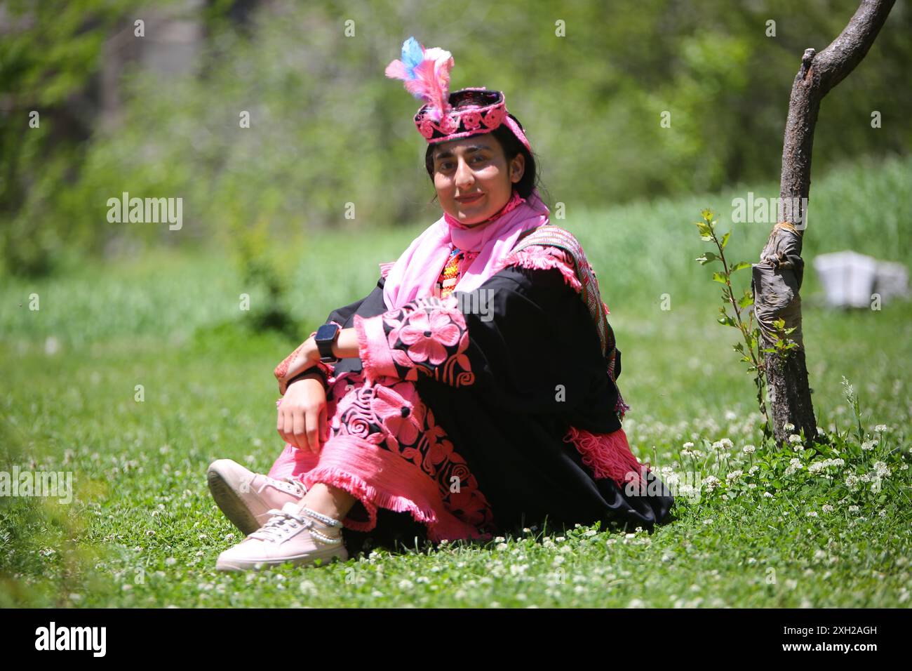 Portrait image of Kalash tribe girl in tradditional costume from rumbur ...