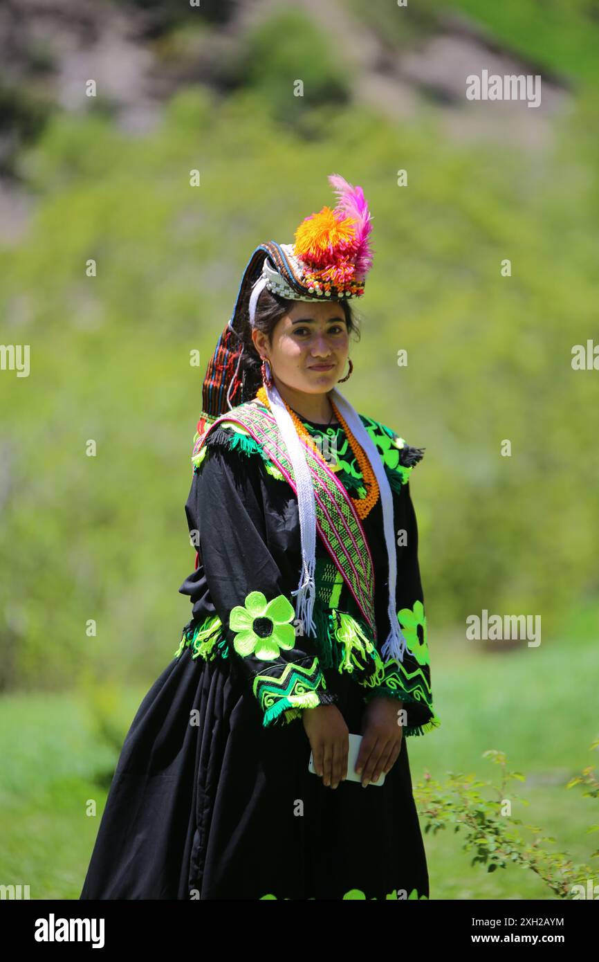 Portrait image of Kalash tribe girl in tradditional costume from rumbur ...