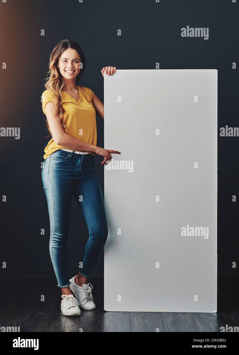 Portrait, board and girl with promotion, pointing and paper sign on ...